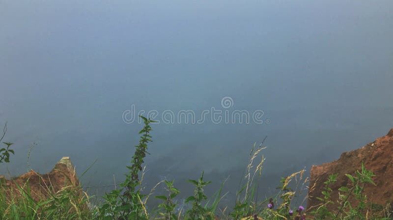 Foggy cliff view stock photo. Image of cliff, heavy - 122941800