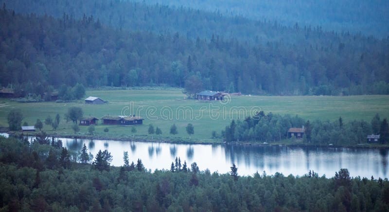 Foggy Mountain Layers and Cabins during Blue Hour and Sunset Stock ...