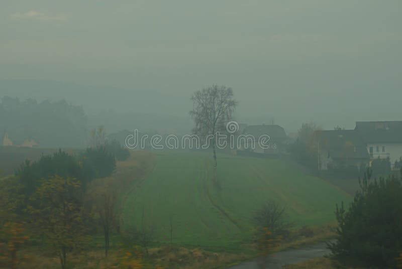 Foggy View of a Rural Small Town and Fields Stock Image - Image of ...