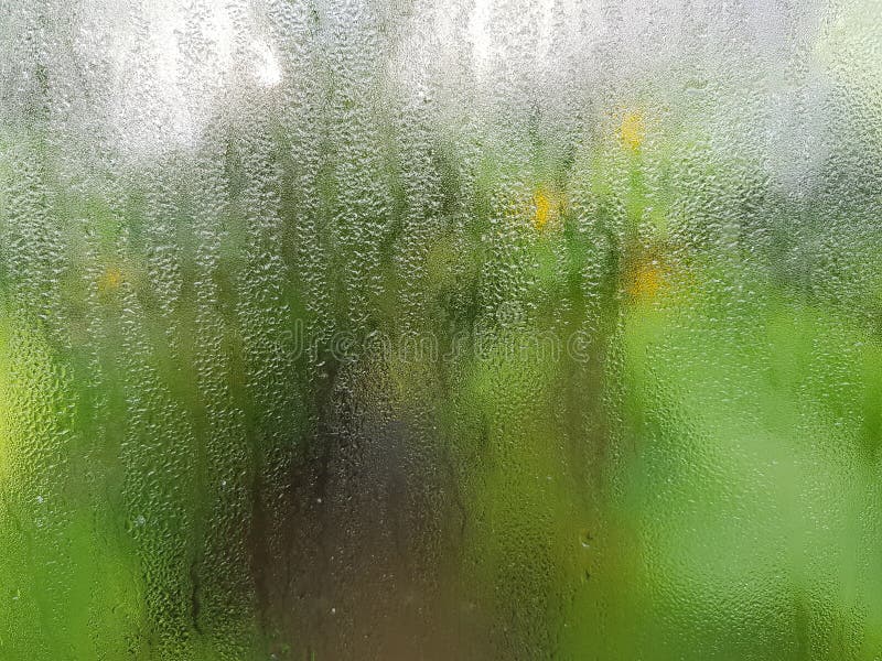Foggy Window Glass with Green Nature Background Stock Photo - Image of ...