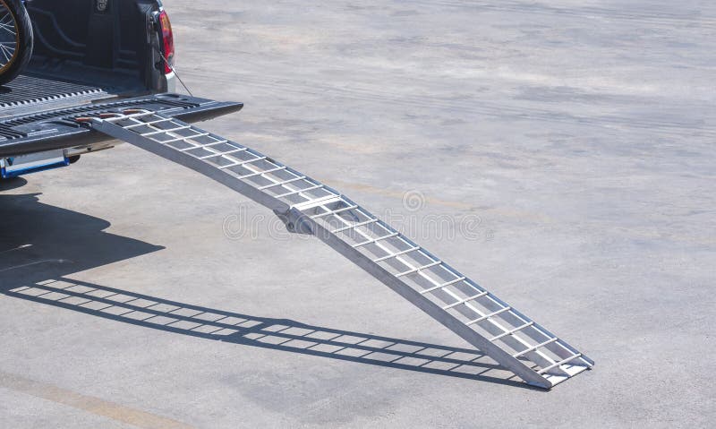Foldable Ladder is Leaning on Back of the Pickup Car for Convenience of ...