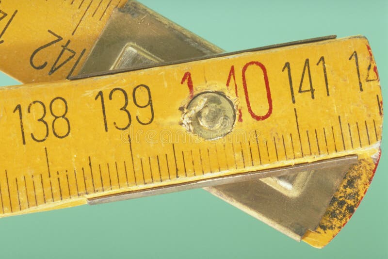 Foldable yellow ruler stock photo. Image of instrument - 92865138
