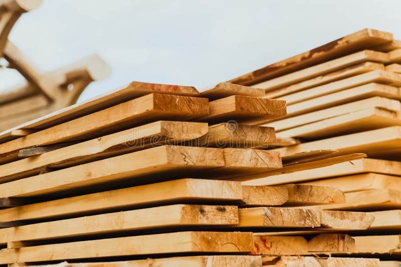 Folded Boards and Logs on Construction Site Stock Photo - Image of ...