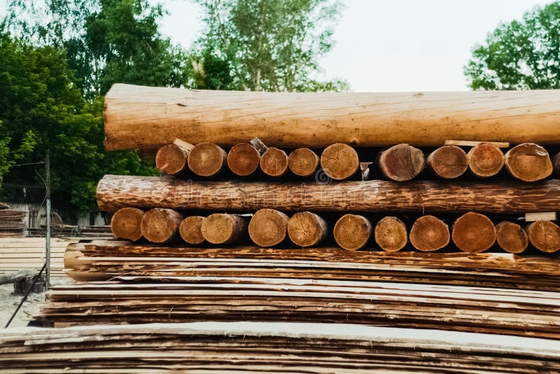 Folded Boards and Logs on Construction Site Stock Photo - Image of ...