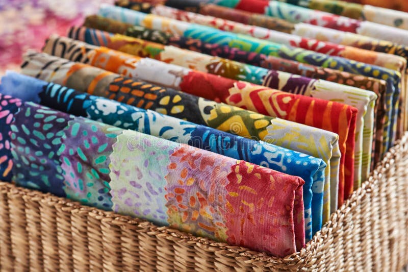 Folded Bright Pieces of Quilting Batik Fabrics in a Basket, Macr Stock ...