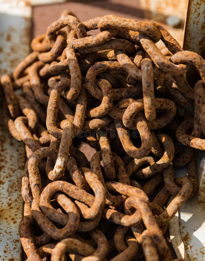 A Folded Chain Worn Out by Time Stock Image - Image of massive, aged ...