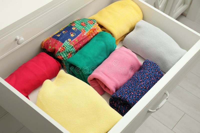 Folded Clothes in Drawer. Apparel Storage Stock Photo - Image of ...