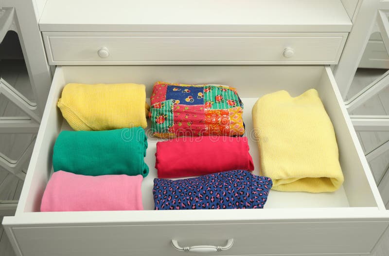 Folded Clothes in Drawer. Apparel Storage Stock Photo - Image of ...