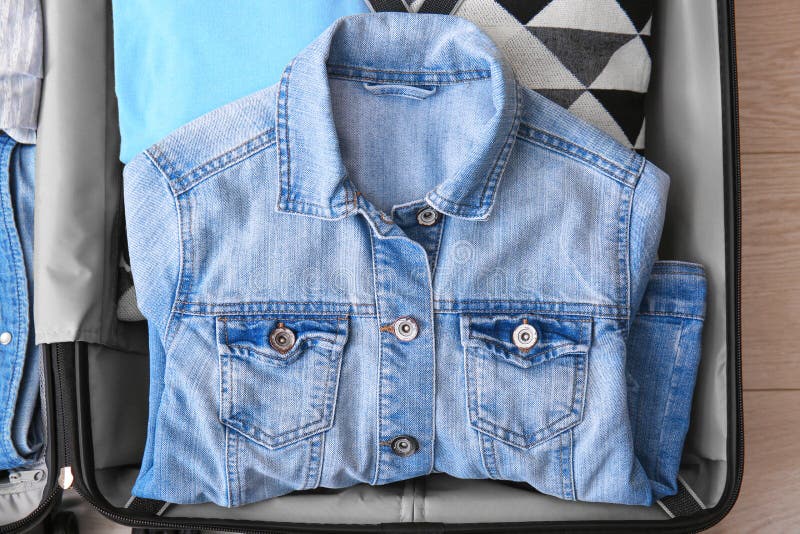 Folded Clothes in Open Suitcase, Top View Stock Image - Image of ...