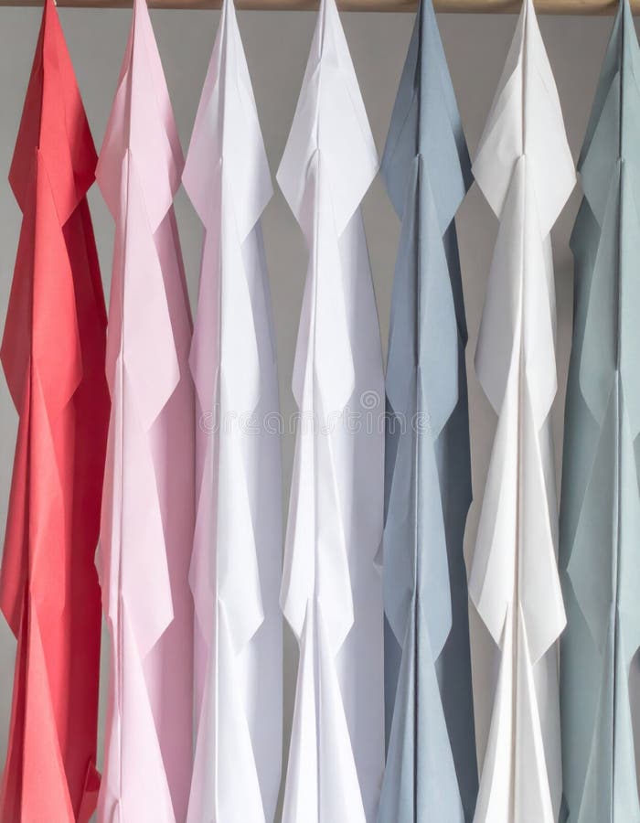 Folded Fabric Samples Hanging in a Row Stock Illustration ...