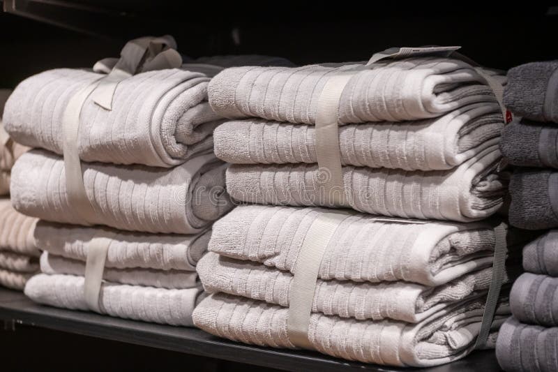 Folded Gray Towels Stacked on a Shelf in a Store Stock Photo - Image of ...