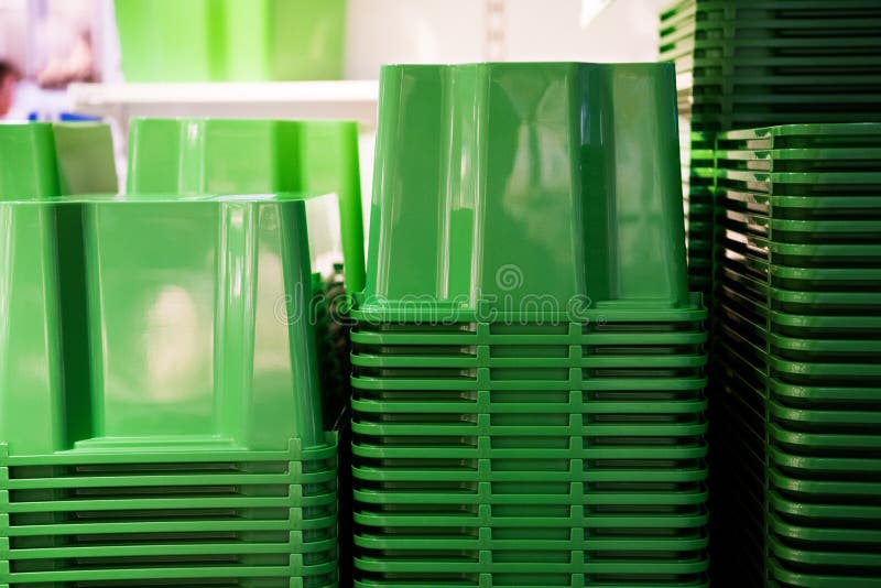 Folded Green Plastic Containers at Store Stock Photo - Image of basket ...