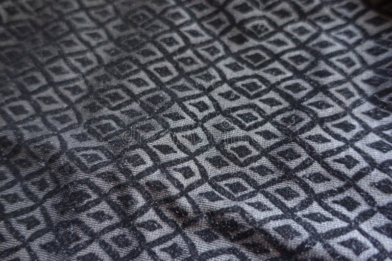 Folded Grey Fabric with Black Diamonds Pattern Stock Photo - Image of ...