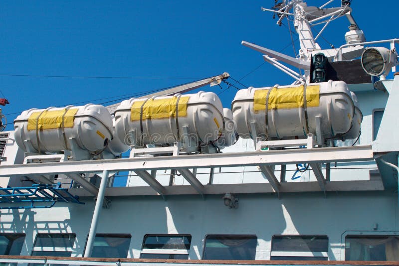 Folded Life Rafts on the Deck of the Ship Stock Image - Image of crane ...
