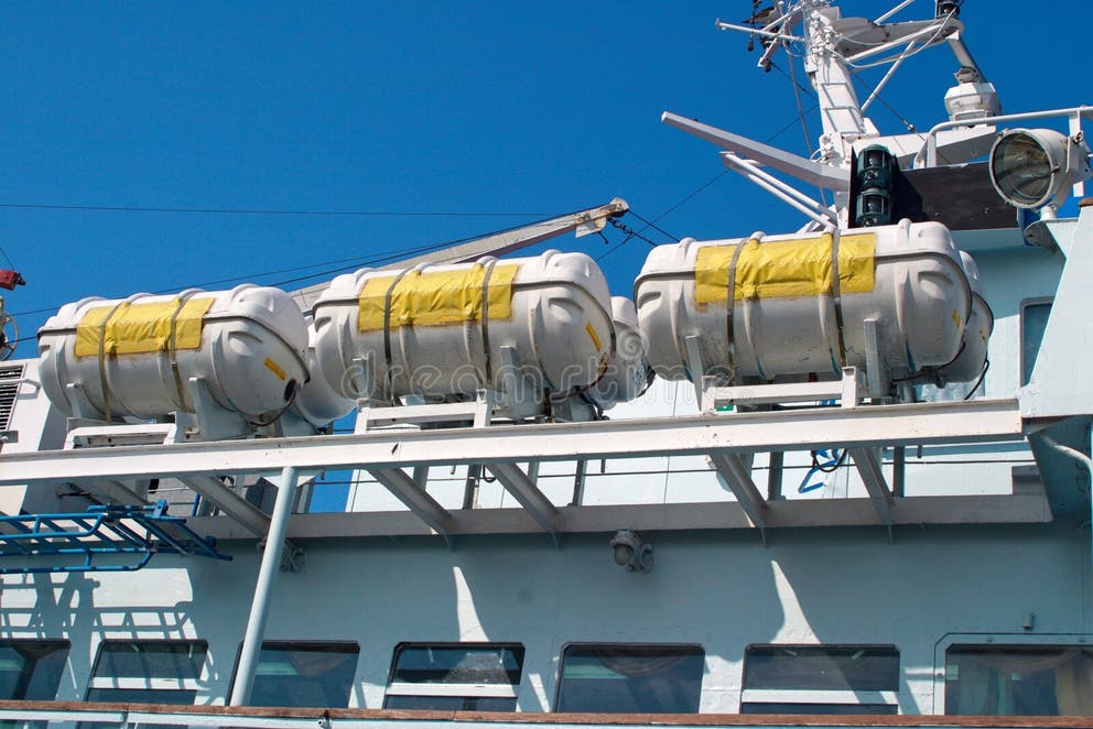 Folded Life Rafts on the Deck of the Ship Stock Image - Image of crane ...