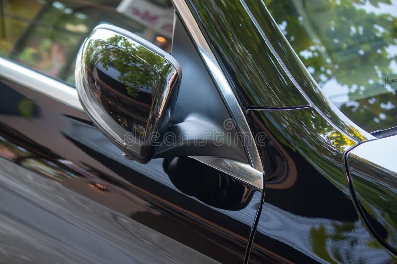 A Folded Mirror on a Modern Car Stock Image - Image of glass, vehicle ...
