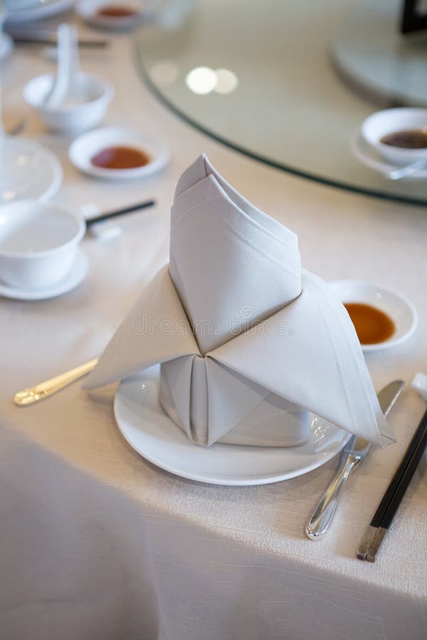 Folded napkin on the table stock photo. Image of elegant - 36779340