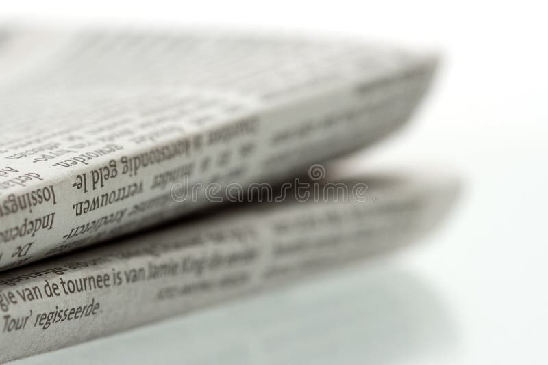 Folded newspaper 1 stock image. Image of close, article - 5346677