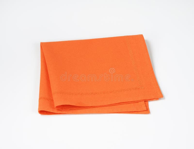 Folded orange napkin stock image. Image of cotton, square - 66729107