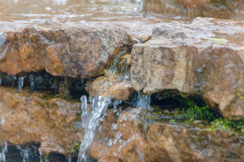 At Folded the Rocks Flowing Stream of Water, Closeup. Stock Photo ...