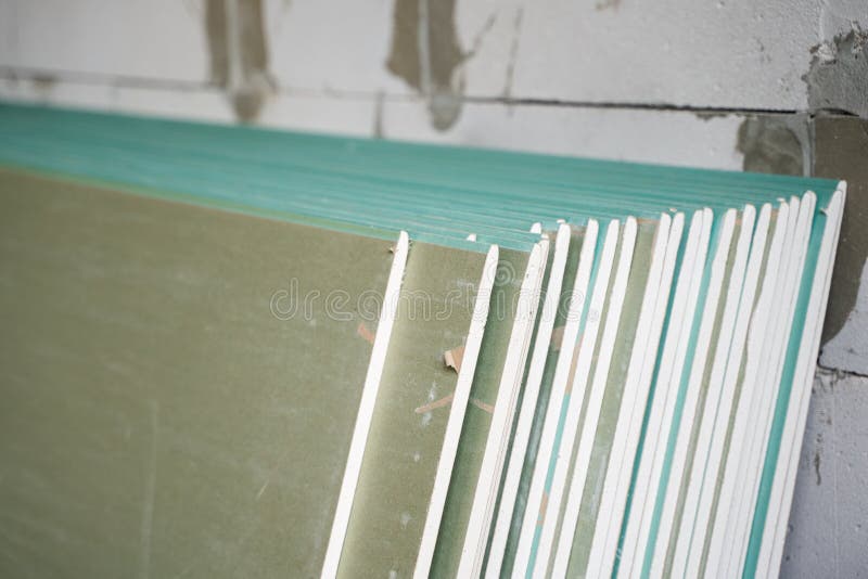 Folded Sheets of Moisture-resistant Drywall Close-up. Building ...