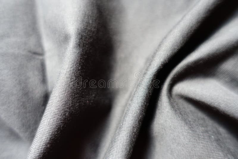 Folded Simple Black Cotton Jersey Fabric Stock Image - Image of ...