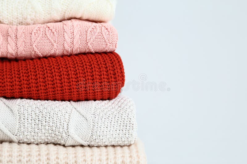 Folded sweaters stock photo. Image of laundry, object - 134624660