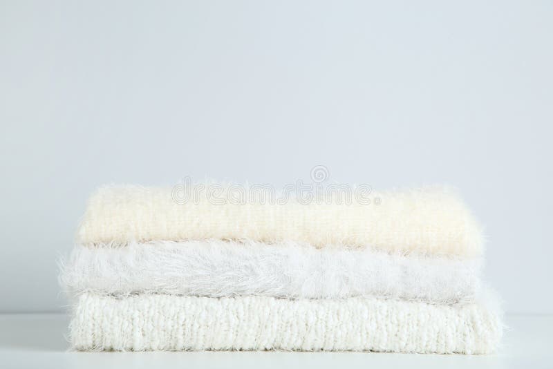 Folded sweaters stock image. Image of knit, collection - 157142335