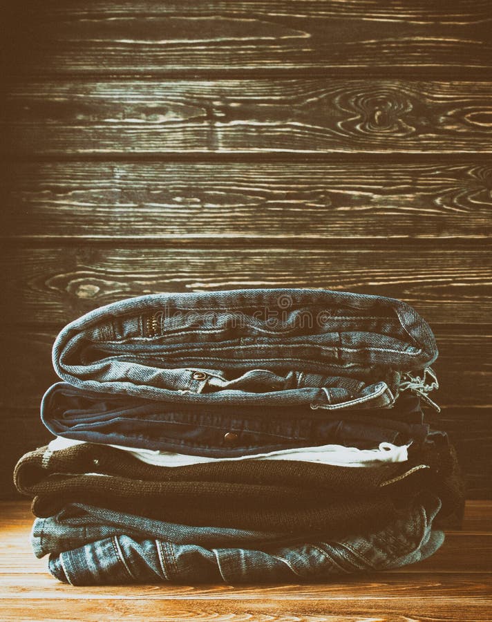 Folded Things on Old Suitcase, Isolated on White Background Stock Image ...