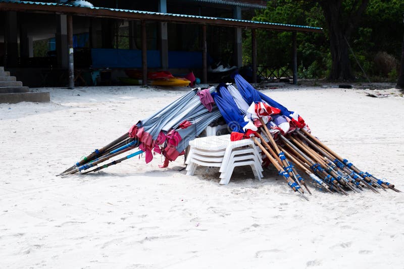 Folded Umbrellas on the Beach Stock Photo - Image of umbrella, rimini ...