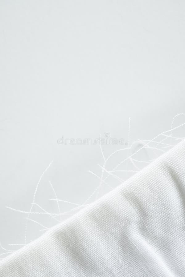 Folded White Fabric with Frayed Edge Showing Threrads Stock Image ...