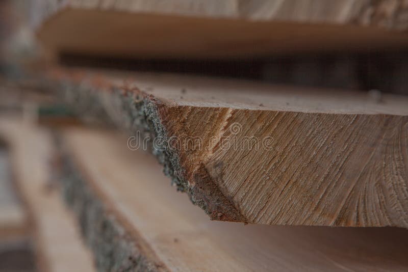 Folded Wooden Planks in a Sawmill. Piled Boards As Texture Stock Photo ...