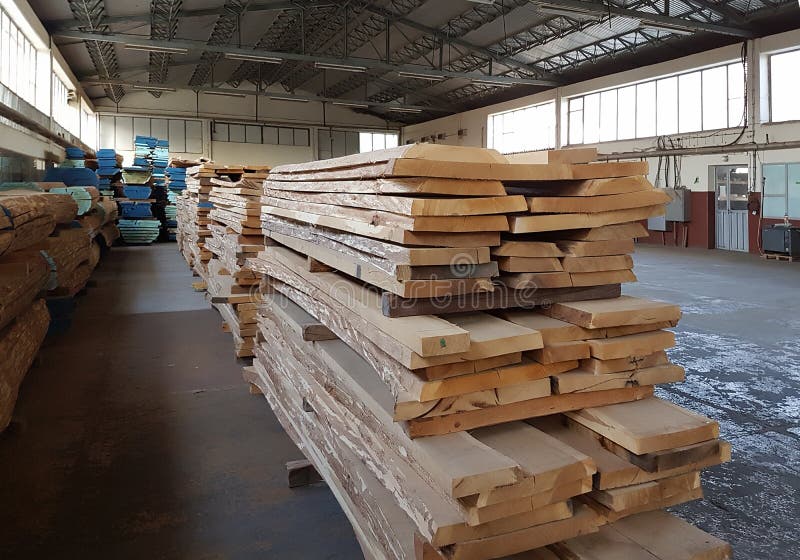 Folded Wooden Planks in a Sawmill. Piled Boards As Texture Stock Image ...