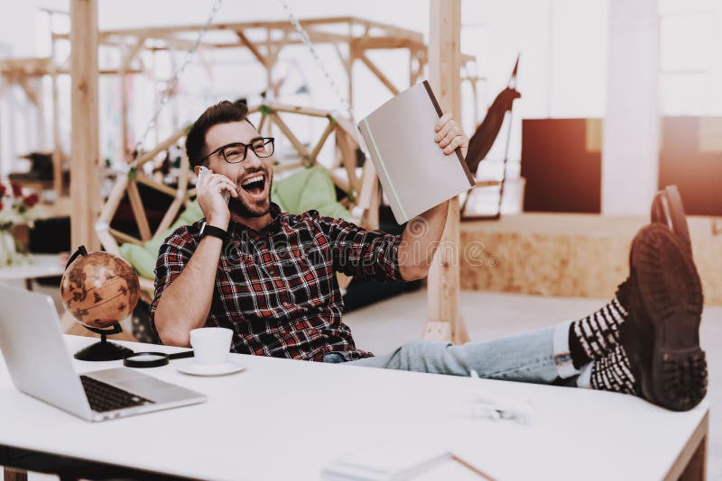 Folder. Talke Phone. Feet on Table. Comfortable. Stock Photo - Image of ...