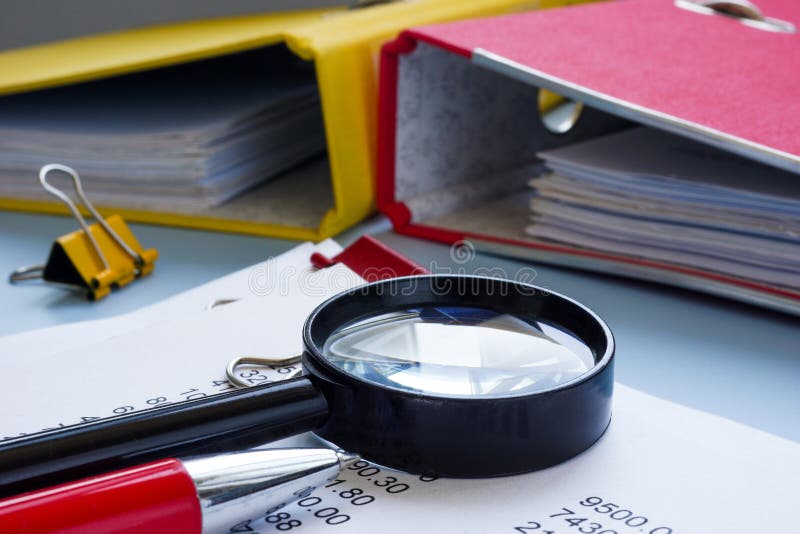 Folders with Audit Report, Accounting Ledger and Magnifying Glass ...