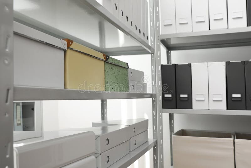 Folders and Boxes with Documents on Shelves Stock Photo - Image of ...