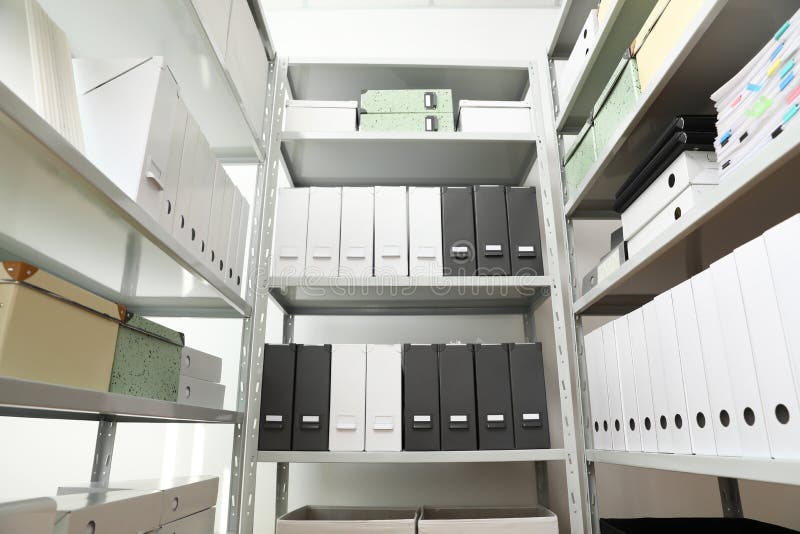 Folders and Boxes with Documents on Shelves Stock Image - Image of ...