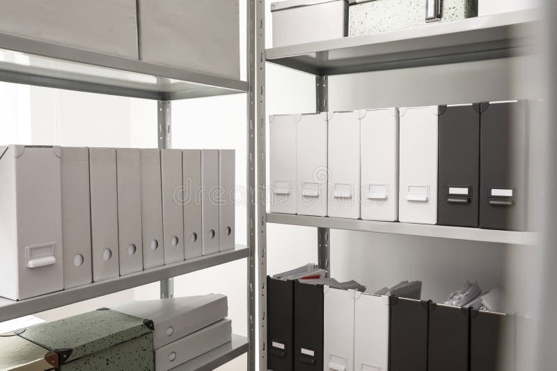 Folders and Boxes with Documents on Shelves Stock Photo - Image of ...