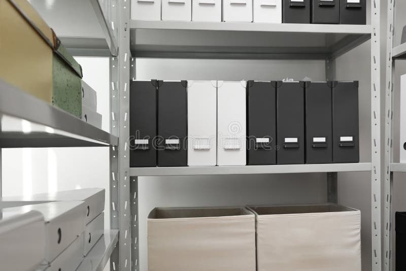 Folders and Boxes with Documents on Shelves Stock Photo - Image of ...