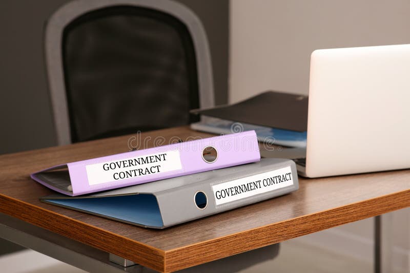 Folders with Government Contract Labels on Desk in Office Stock Image ...