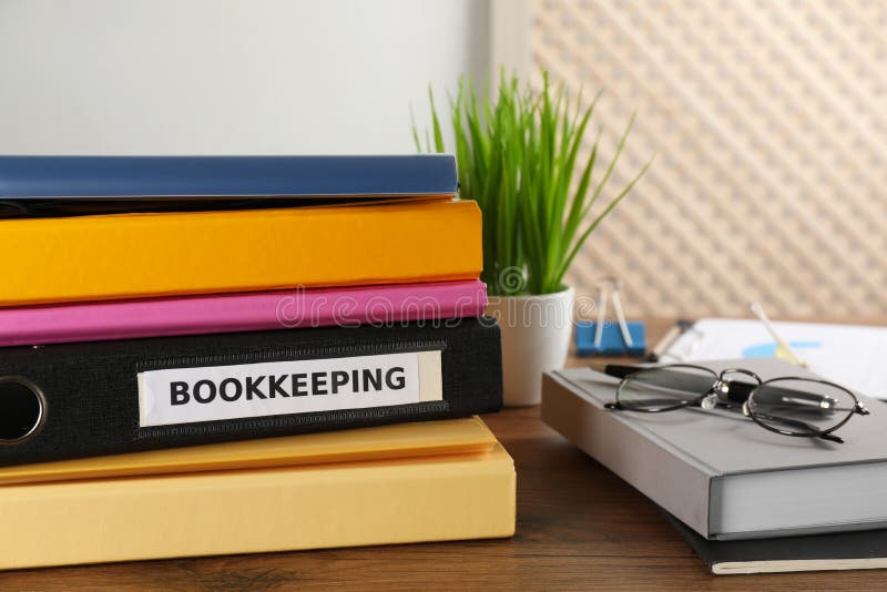 Folders and Stationery on Desk in Office. Bookkeeper`s Workplace Stock ...