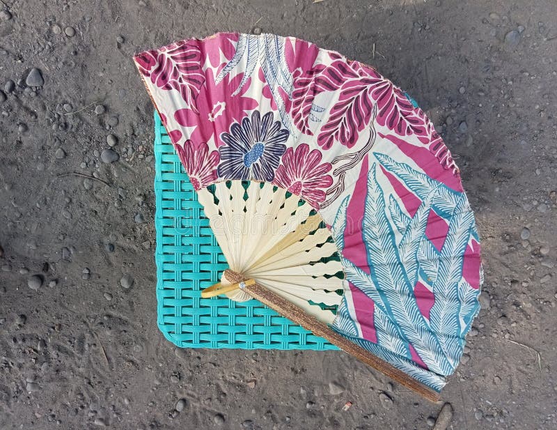 Folding batik fan stock image. Image of patterned, batik - 292514817