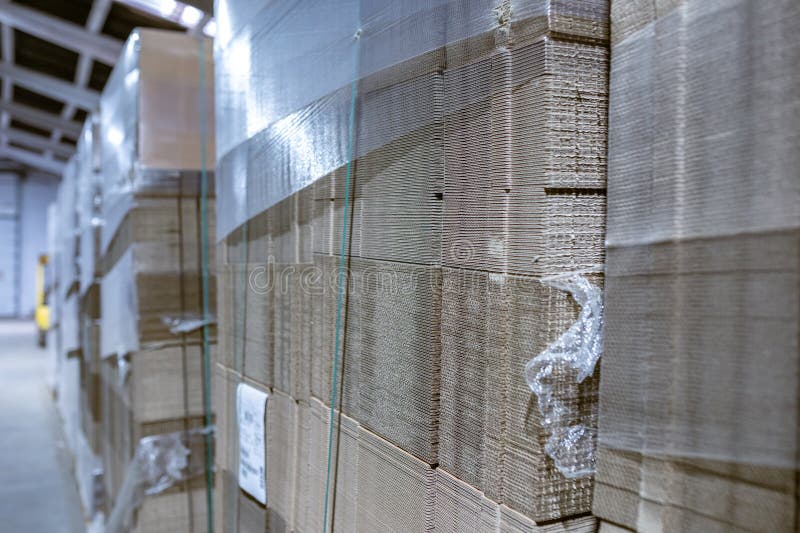 Folding Cardboard Boxes. Perforated Sheets of Corrugated Cardboard a ...