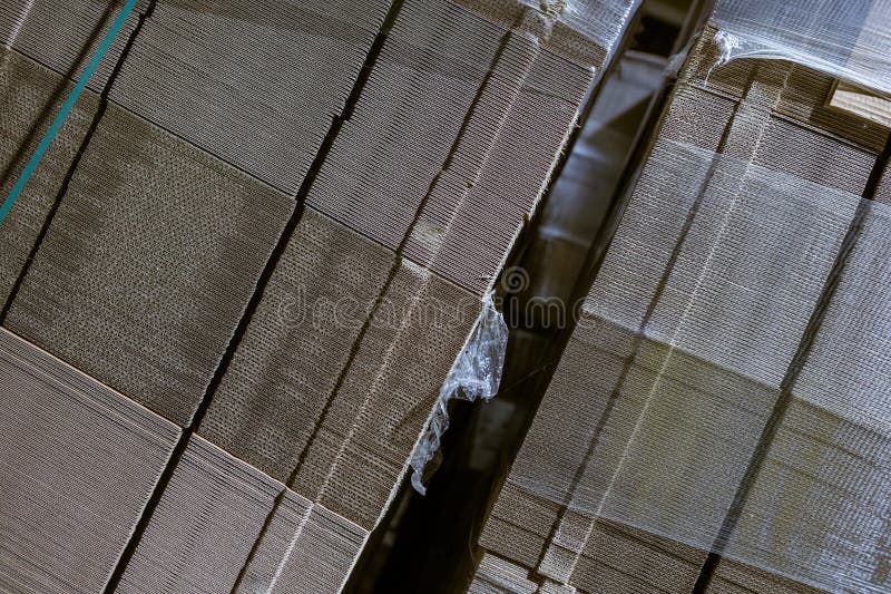 Folding Cardboard Boxes. Perforated Sheets of Corrugated Cardboard a ...