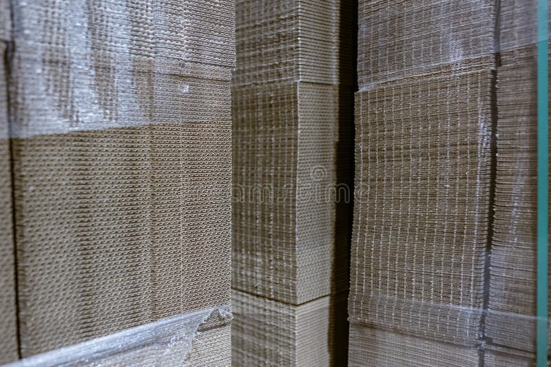 Folding Cardboard Boxes. Perforated Sheets of Corrugated Cardboard a ...