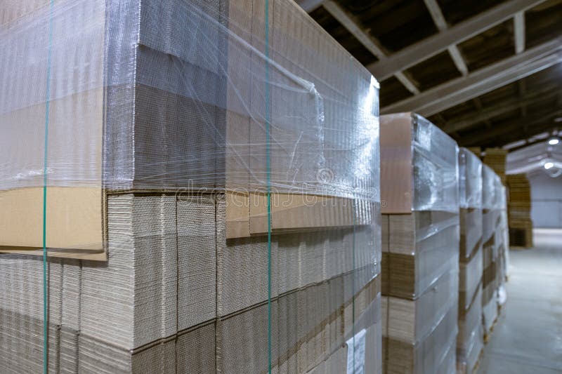Folding Cardboard Boxes. Perforated Sheets of Corrugated Cardboard a ...
