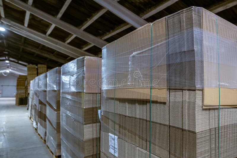 Folding Cardboard Boxes. Perforated Sheets of Corrugated Cardboard a ...