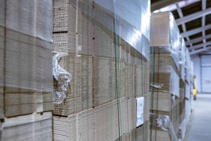 Folding Cardboard Boxes. Perforated Sheets of Corrugated Cardboard a ...