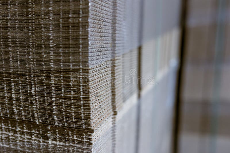 Folding Cardboard Boxes. Perforated Sheets of Corrugated Cardboard a ...