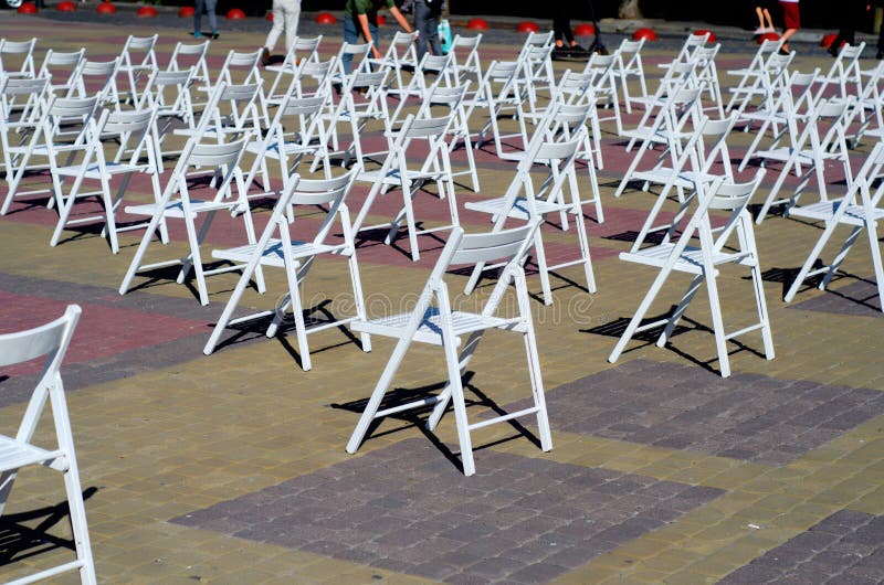 Folding Chairs are Arranged on the Recreation Area. Empty Folding ...